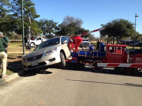 Car hit by train in Houston, little damage reported (2 Miniature ...